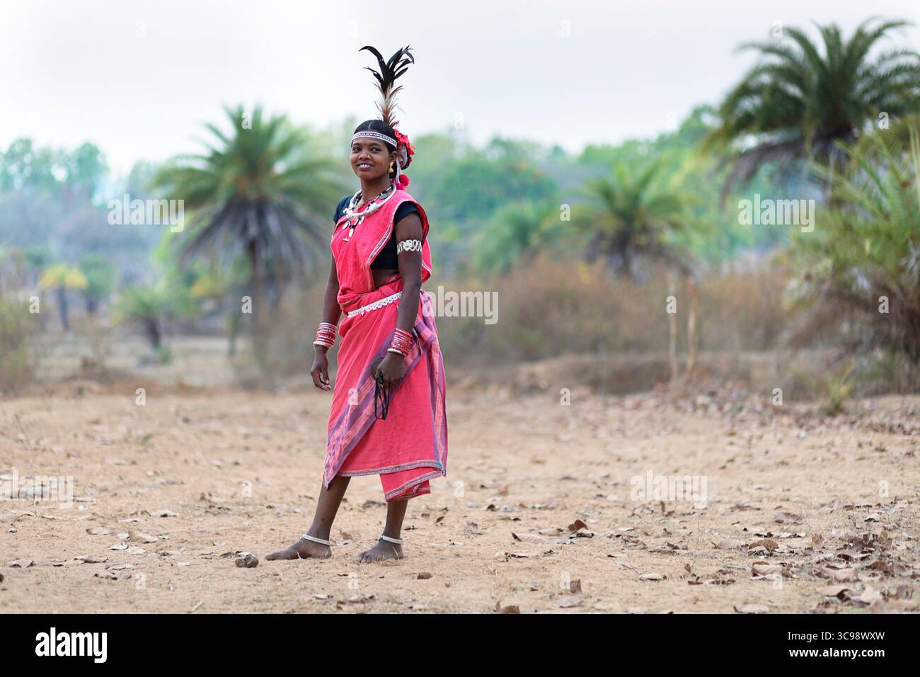 Woman in colourful traditional clothes from Jungle Maria tribe in the ...
