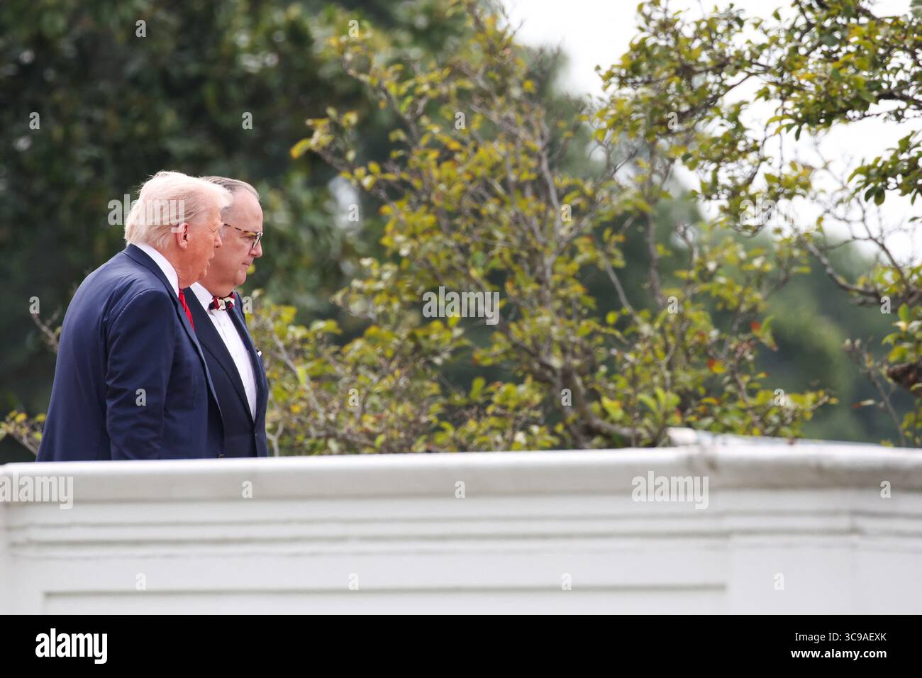 James McCrery of McCrery Architects and President Donald Trump walk on ...