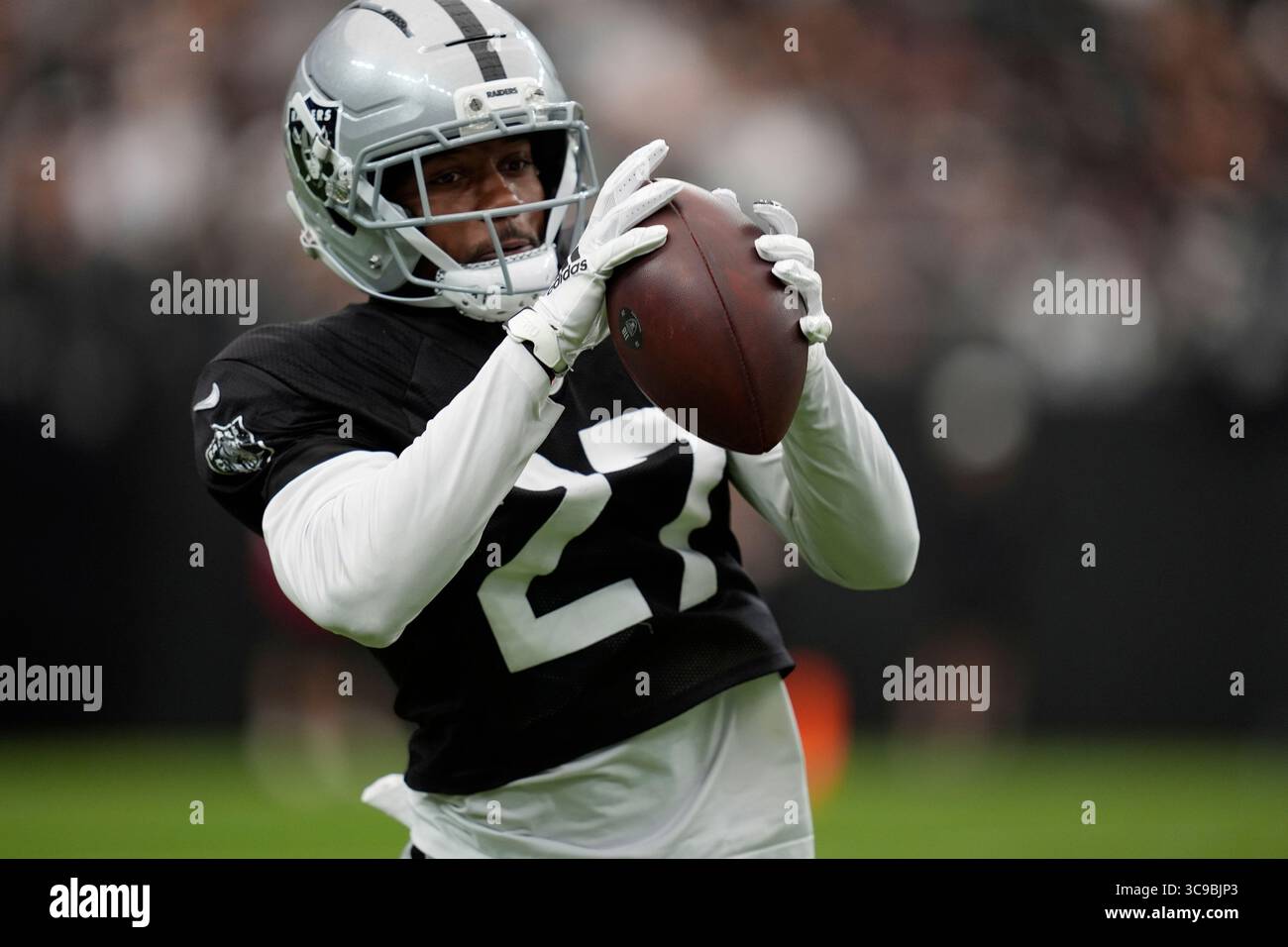 Las Vegas Raiders cornerback Sam Webb (27) takes part in practice at ...