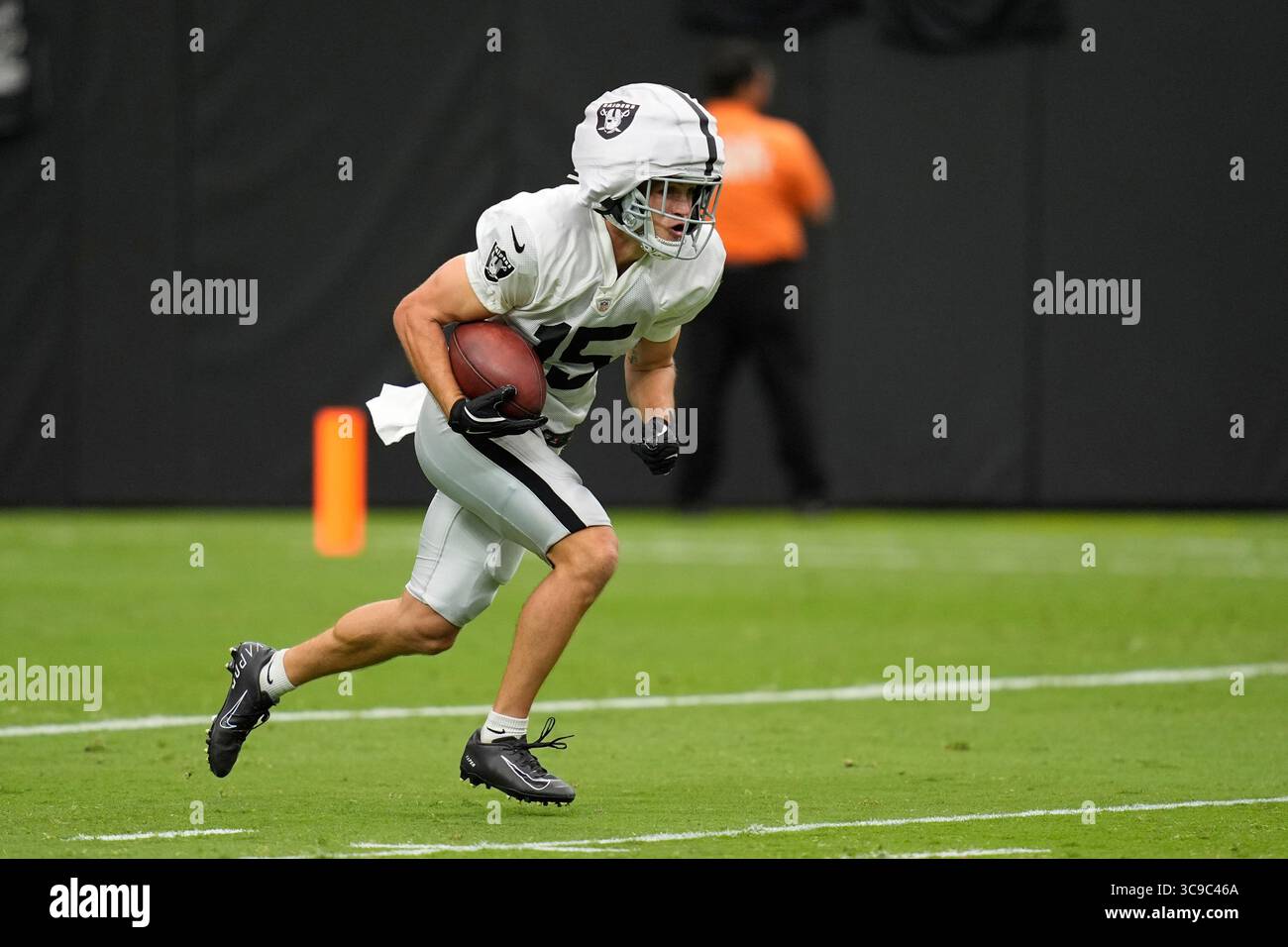 Las Vegas Raiders wide receiver Kyle Philips (15) runs during practice ...