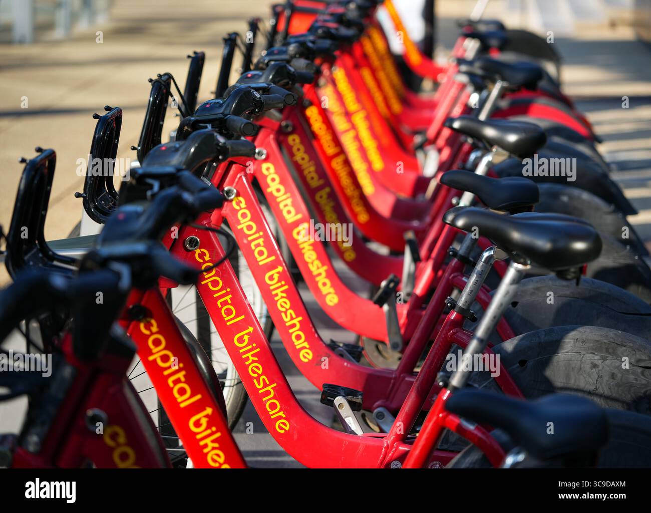 Washington, USA. 04th Aug, 2025. Red bikes from Capital Bikeshare stand ...