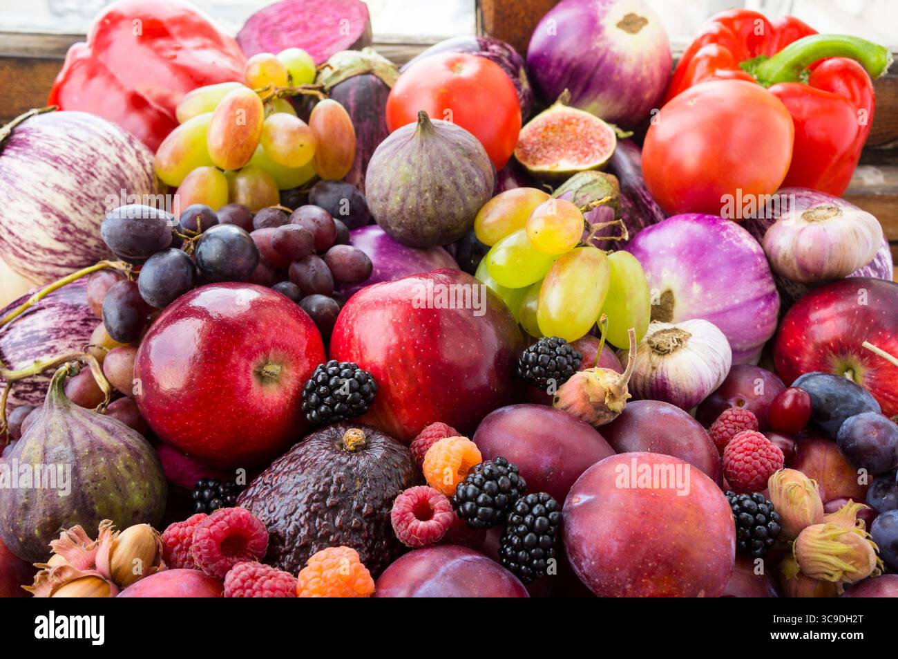 Various fresh autumn fruits and vegetables.Background of rich colors of ...