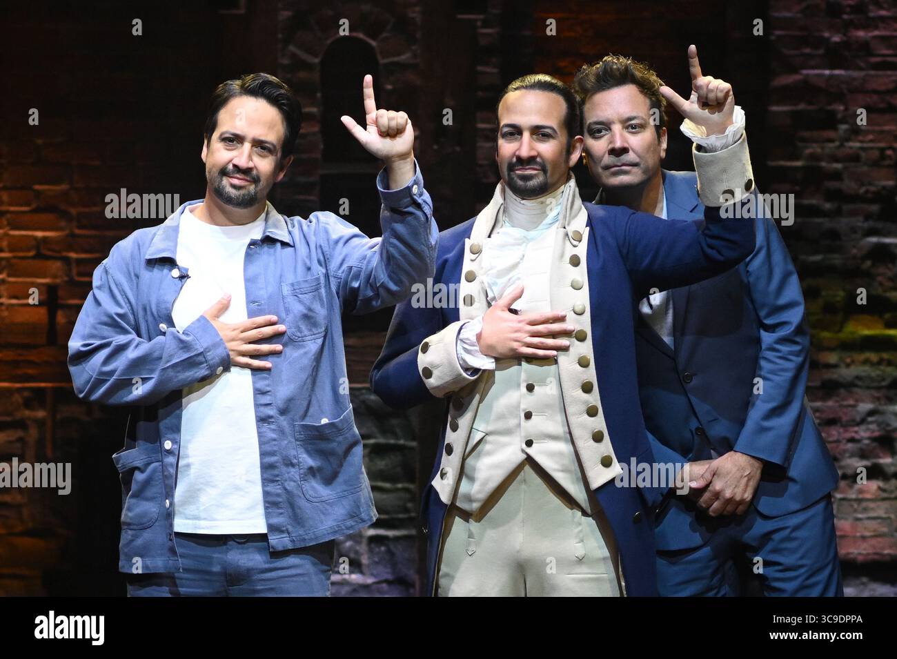 Lin-Manuel Miranda (l) and emcee Jimmy Fallon (r) pose with Madame ...
