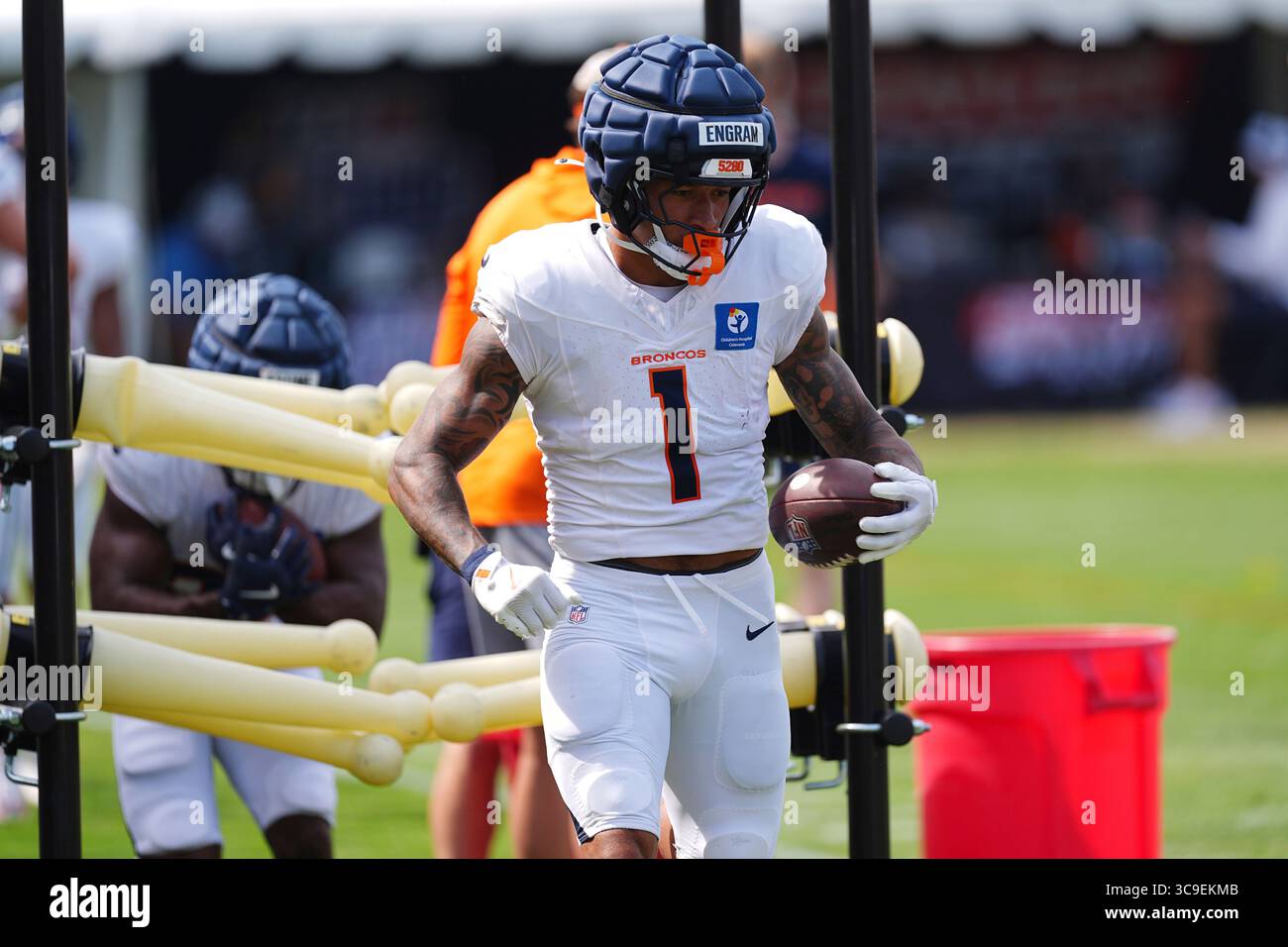 Denver Broncos tight end Evan Engram takes part in drills during practice at the team's. NFL ...