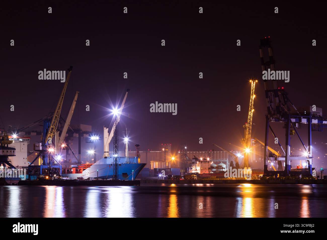 Panorama image of the illuminated cargo port in Novorossiysk, Russia at ...