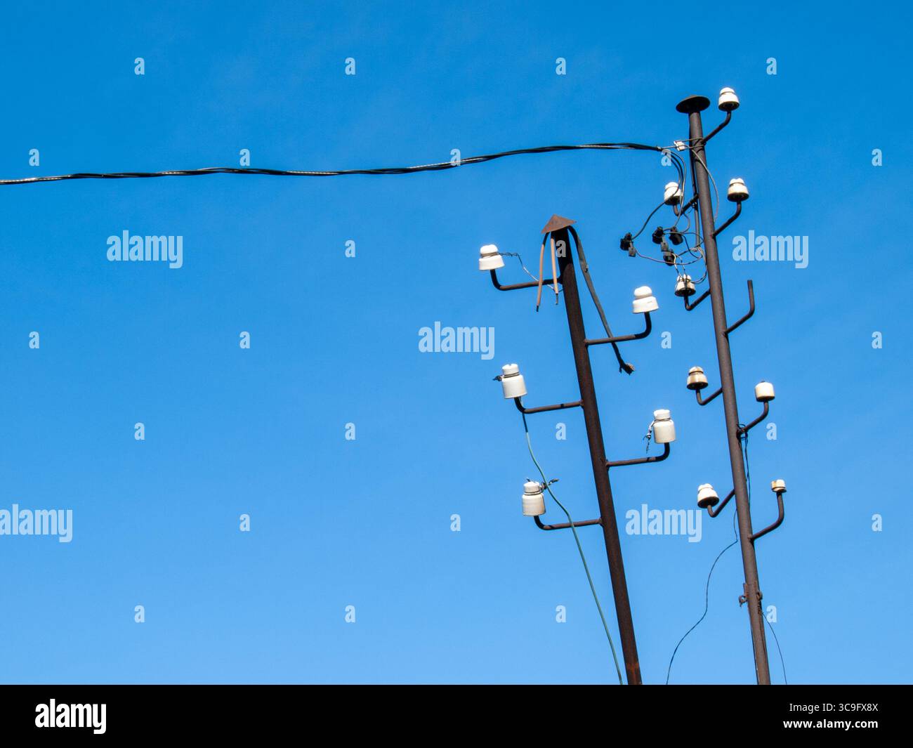 Line wooden poles hi-res stock photography and images - Alamy