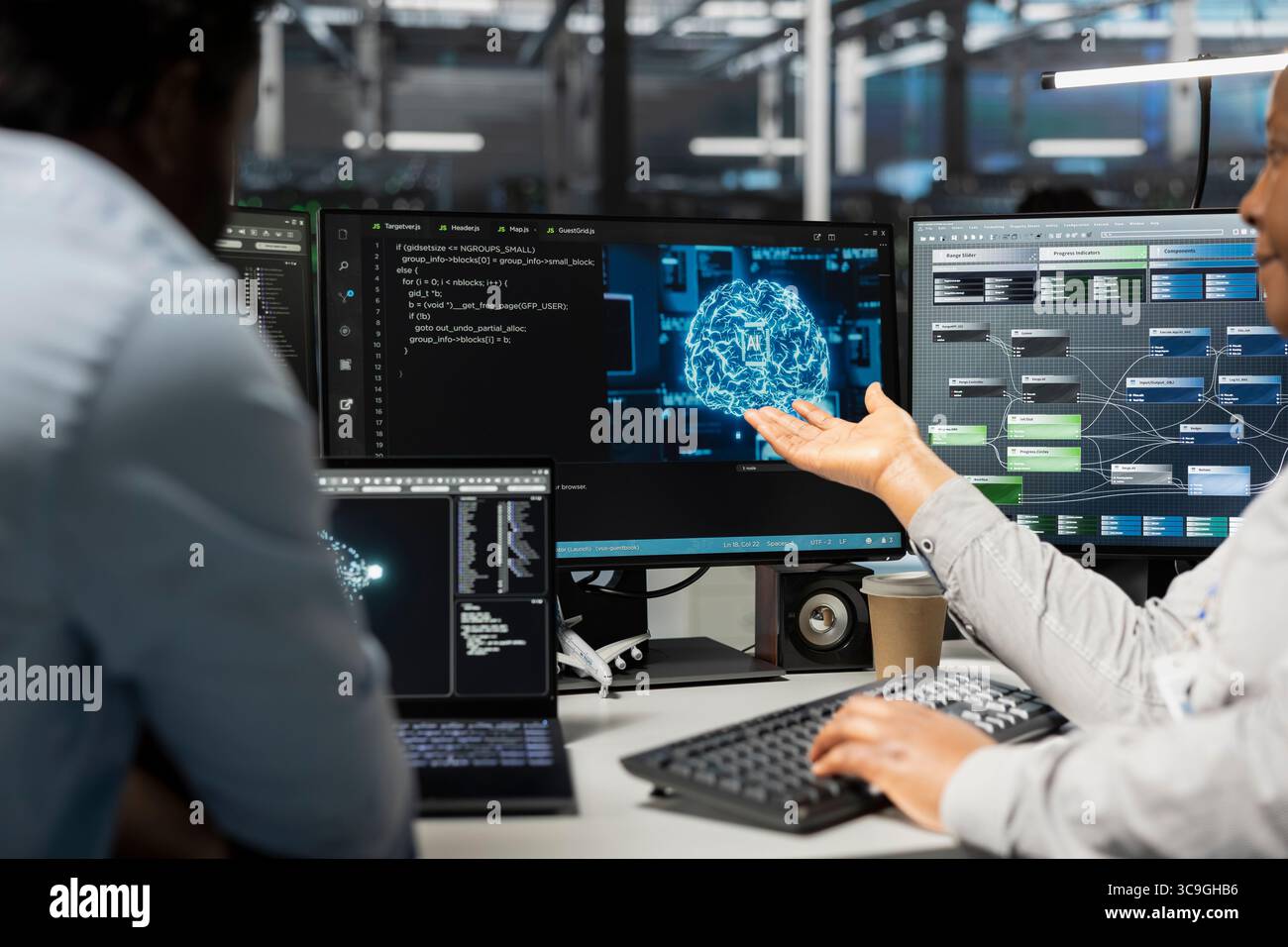 Engineering team inspecting neural network data center used for machine learning. Teamworking ...
