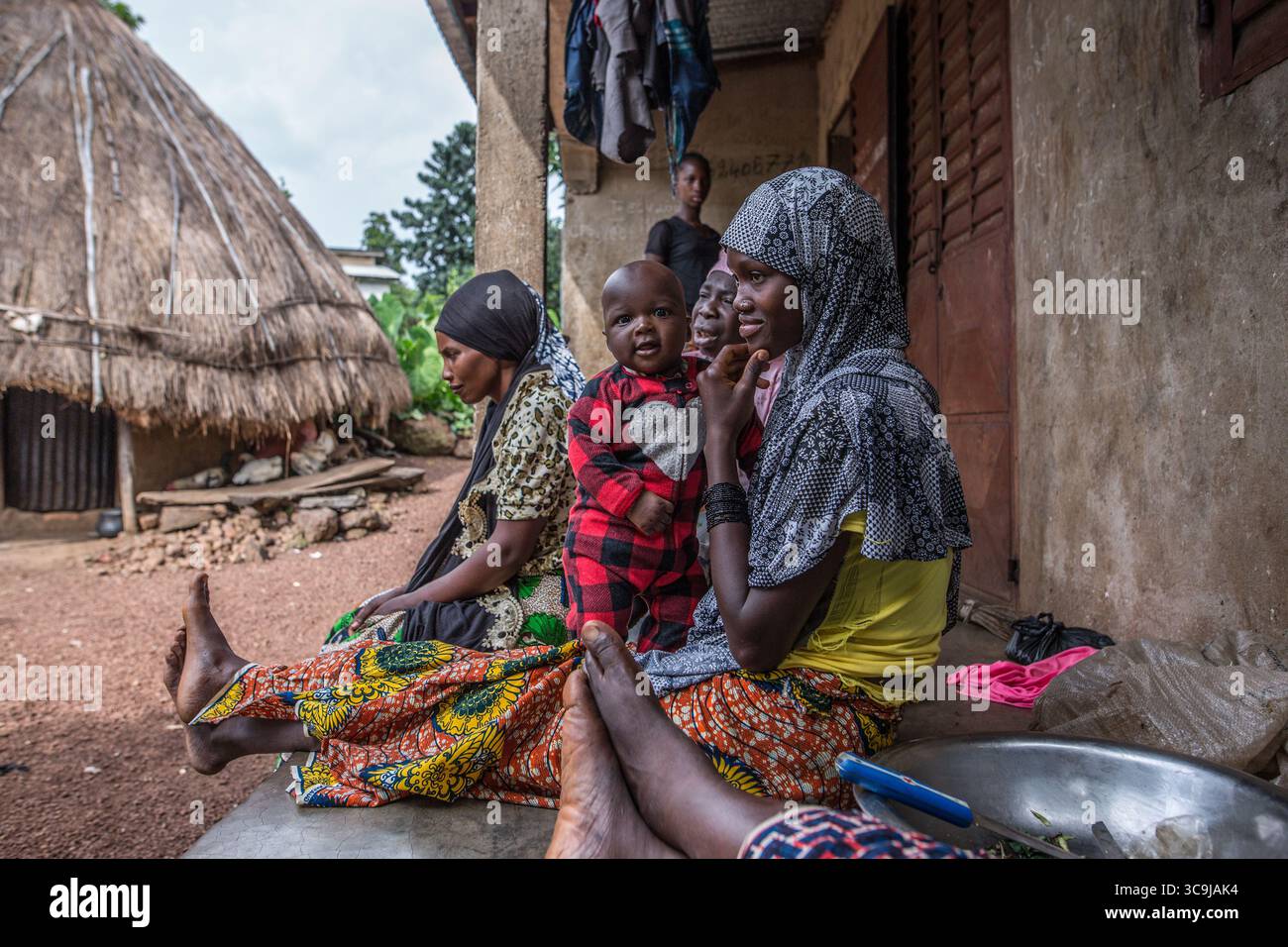 October 2, 2020, Guinea: Portrait of child with his family. .the Stop ...