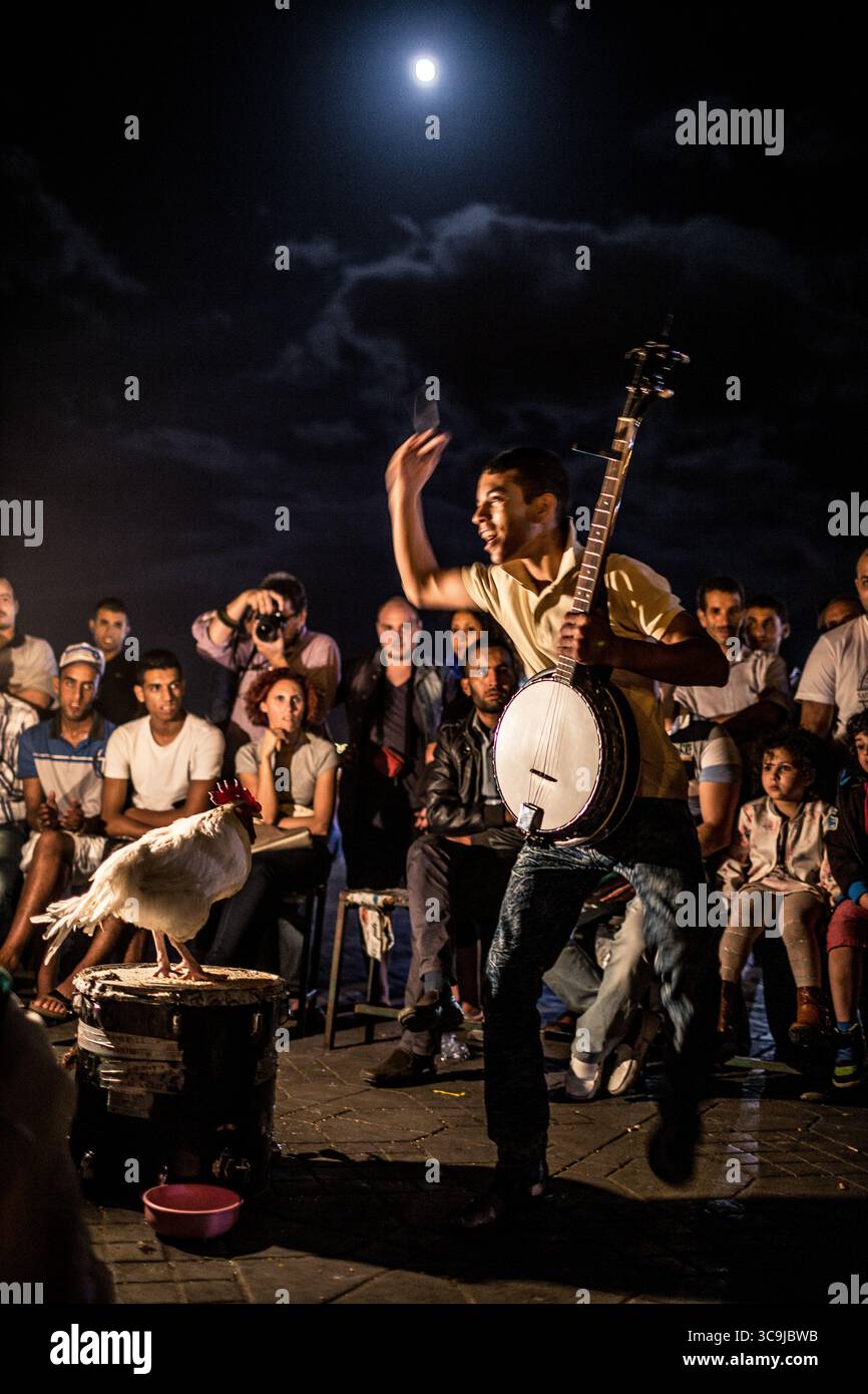 Traditional cultural Gnawa music scenes from around the Souk markets of ...