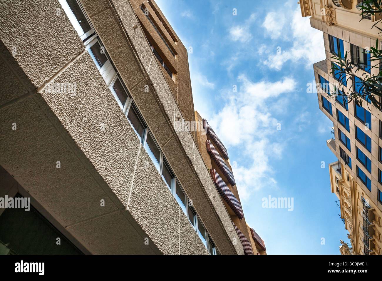 Upward view of a 1980s residential building in Valencia, Spain, showing ...