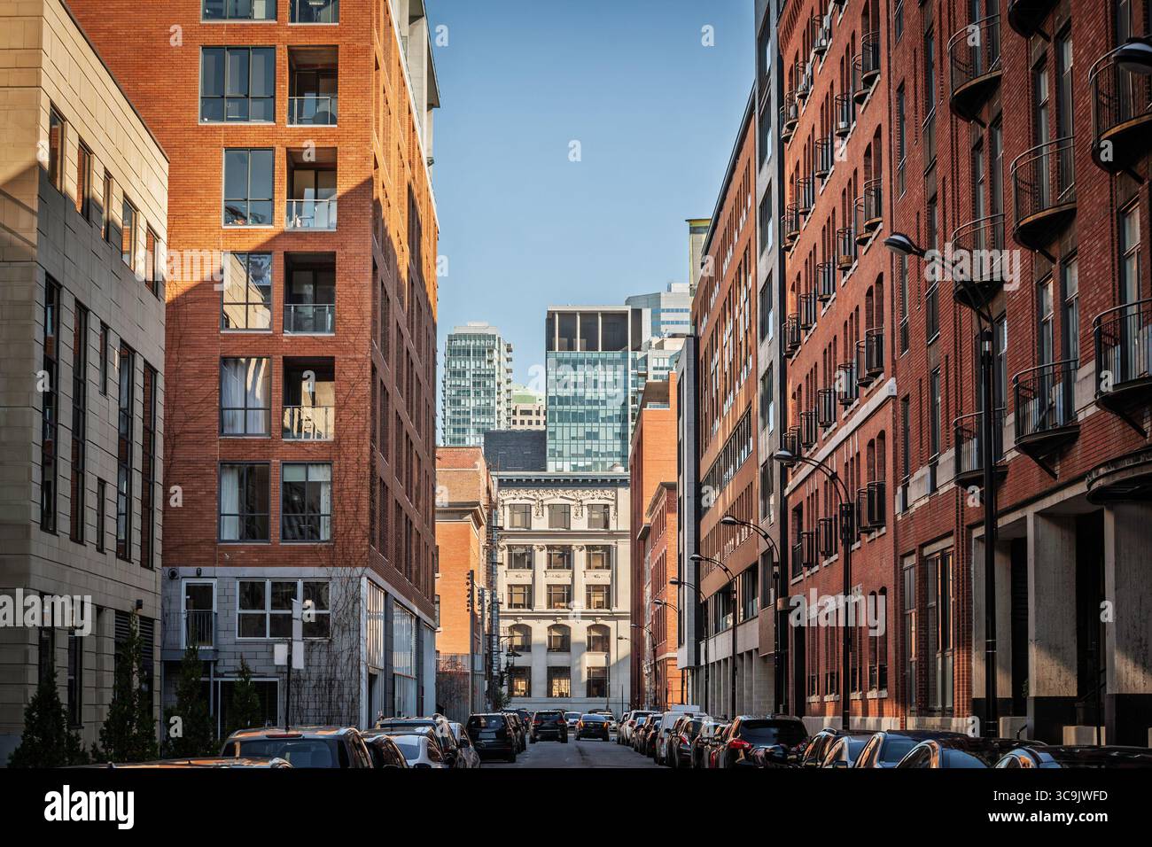 Brick apartment blocks (Condos) leading to glass office towers in ...