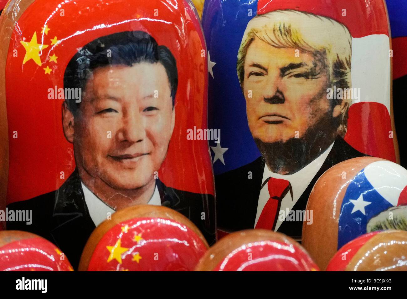 FILE - Traditional Russian wooden dolls called Matryoshka depicting ...