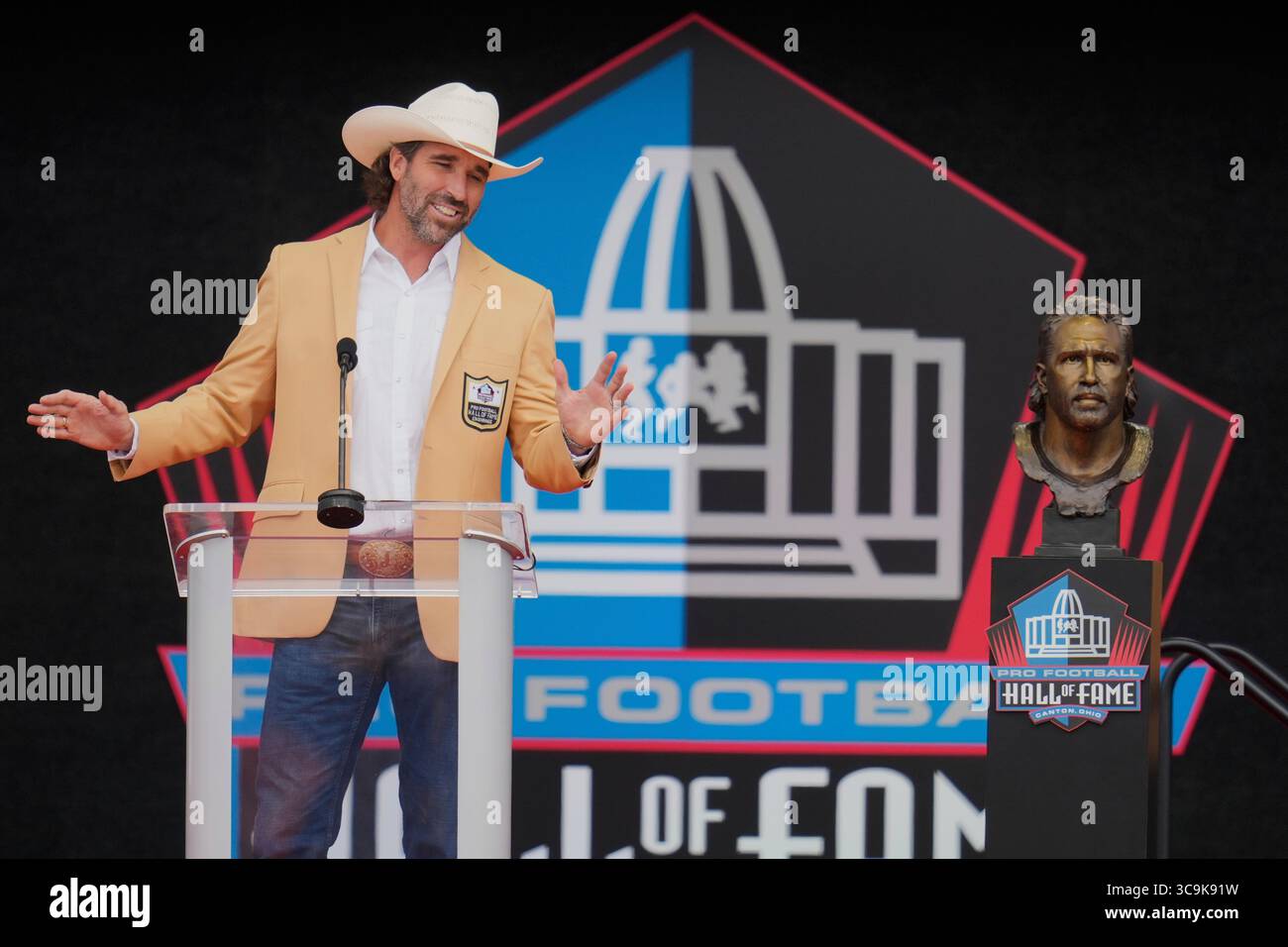 Former NFL player Jared Allen, speaks next to his bust during his ...