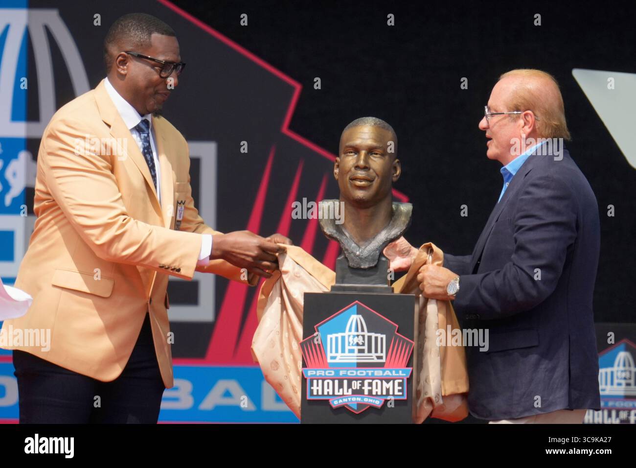 Former NFL player Antonio Gates, left, and Dean Spanos, owner of the ...