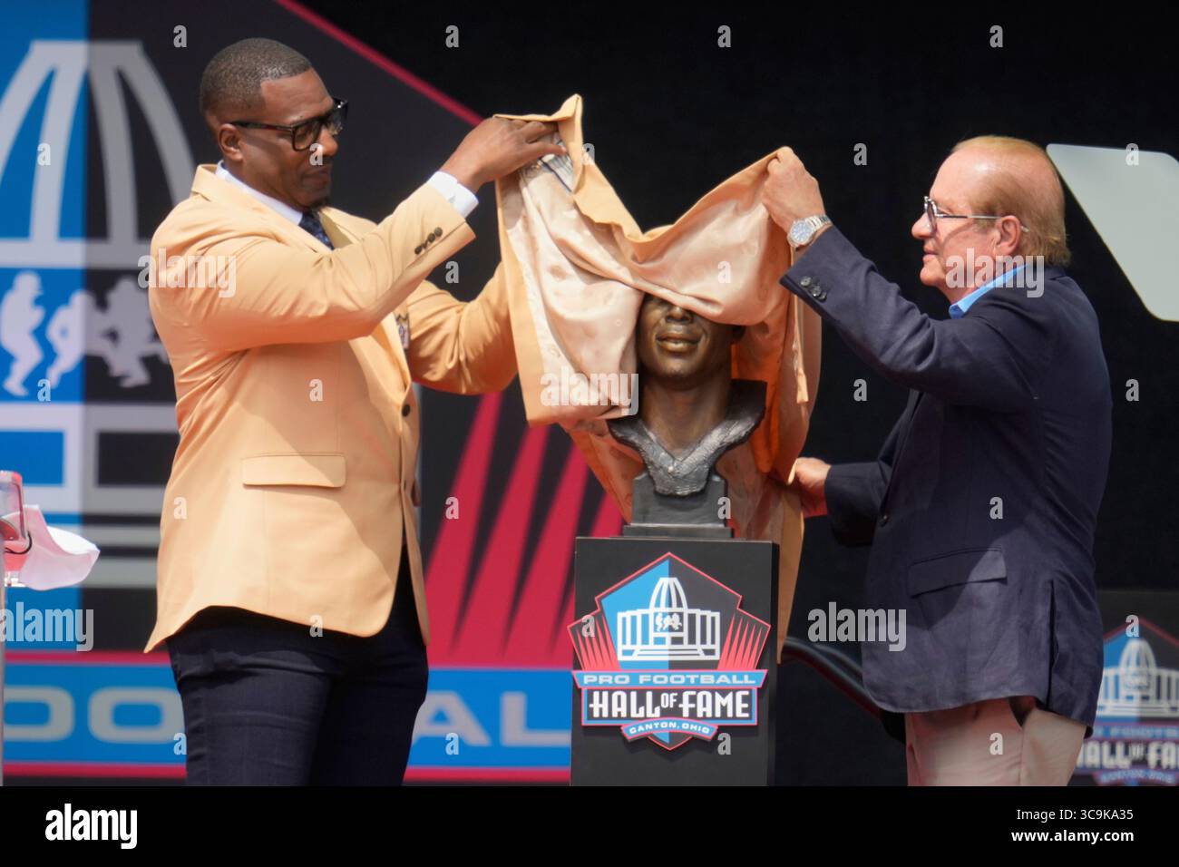 Former NFL player Antonio Gates, left, and Dean Spanos, owner of the ...