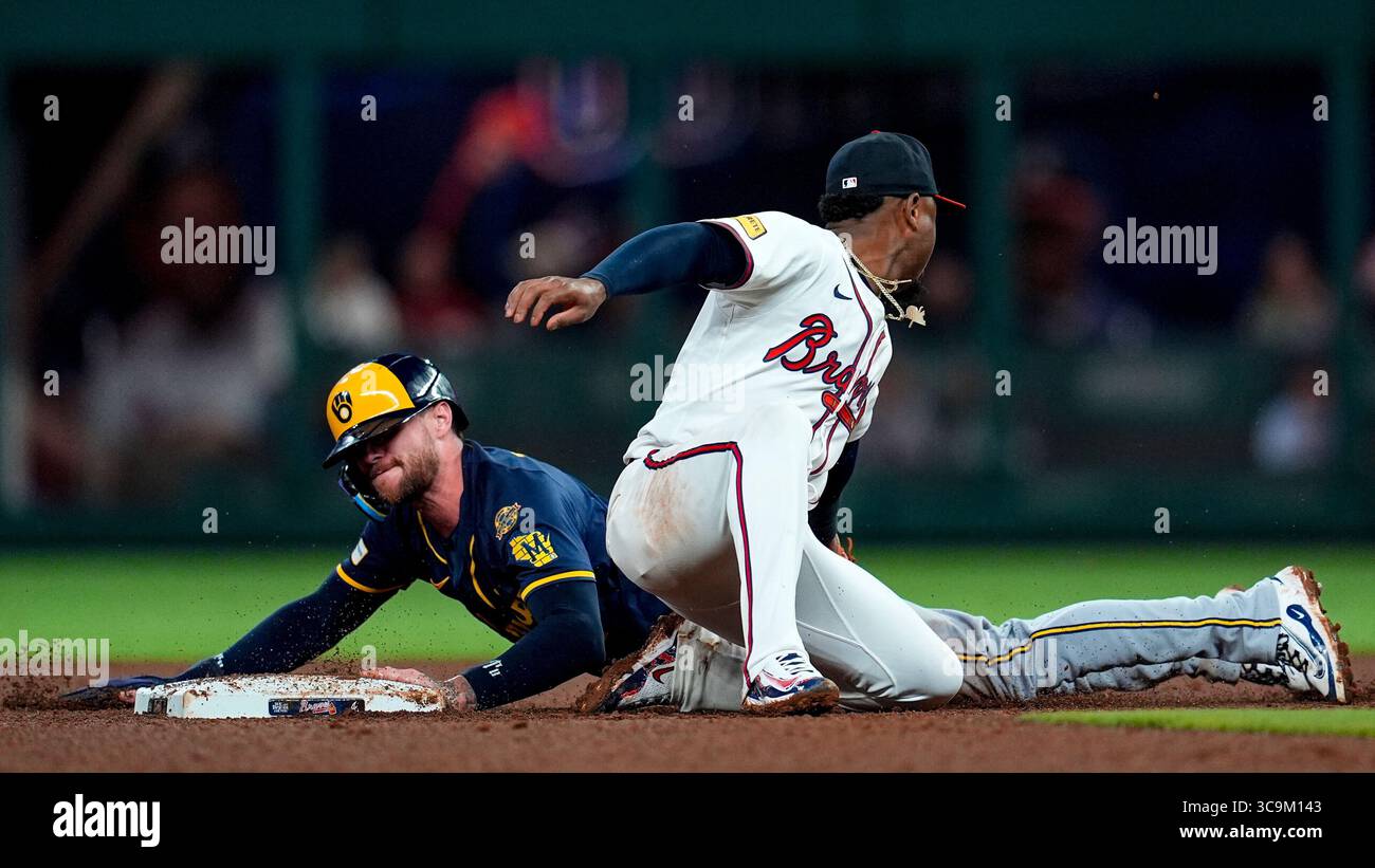 Milwaukee Brewers' Brice Turang (2) steals the base against Atlanta ...