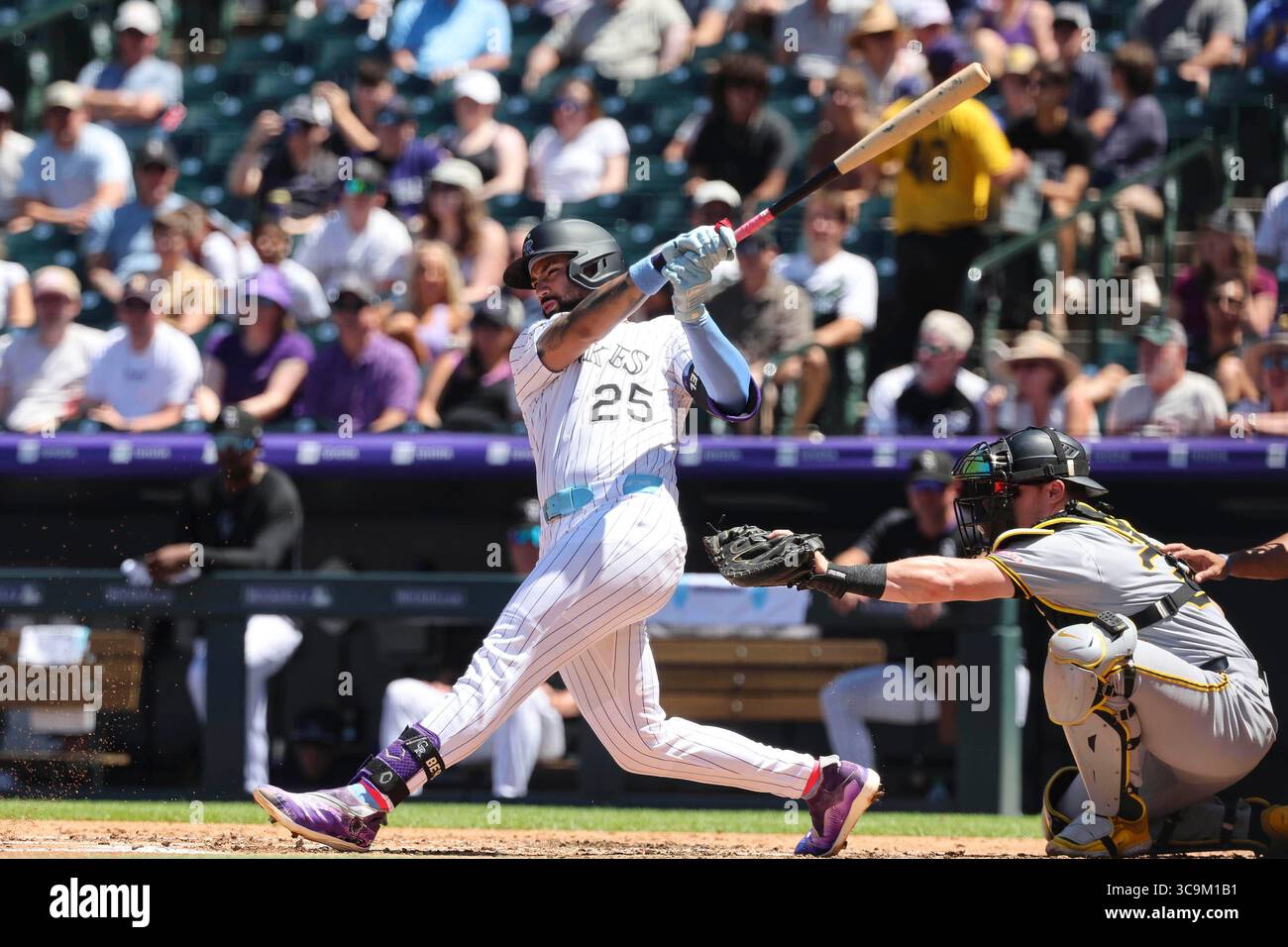 Colorado Rockies shortstop Warming Bernabel (25) swings at the pitch in ...