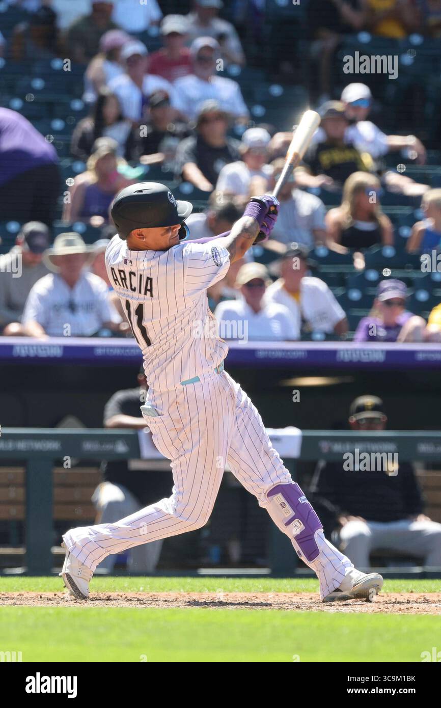 Colorado Rockies shortstop Orlando Arcia (11) swings at the pitch in an ...
