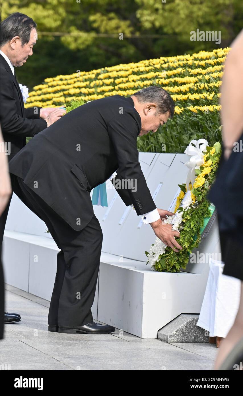 Japanese Prime Minister Shigeru Ishiba lays flowers during a ceremony ...