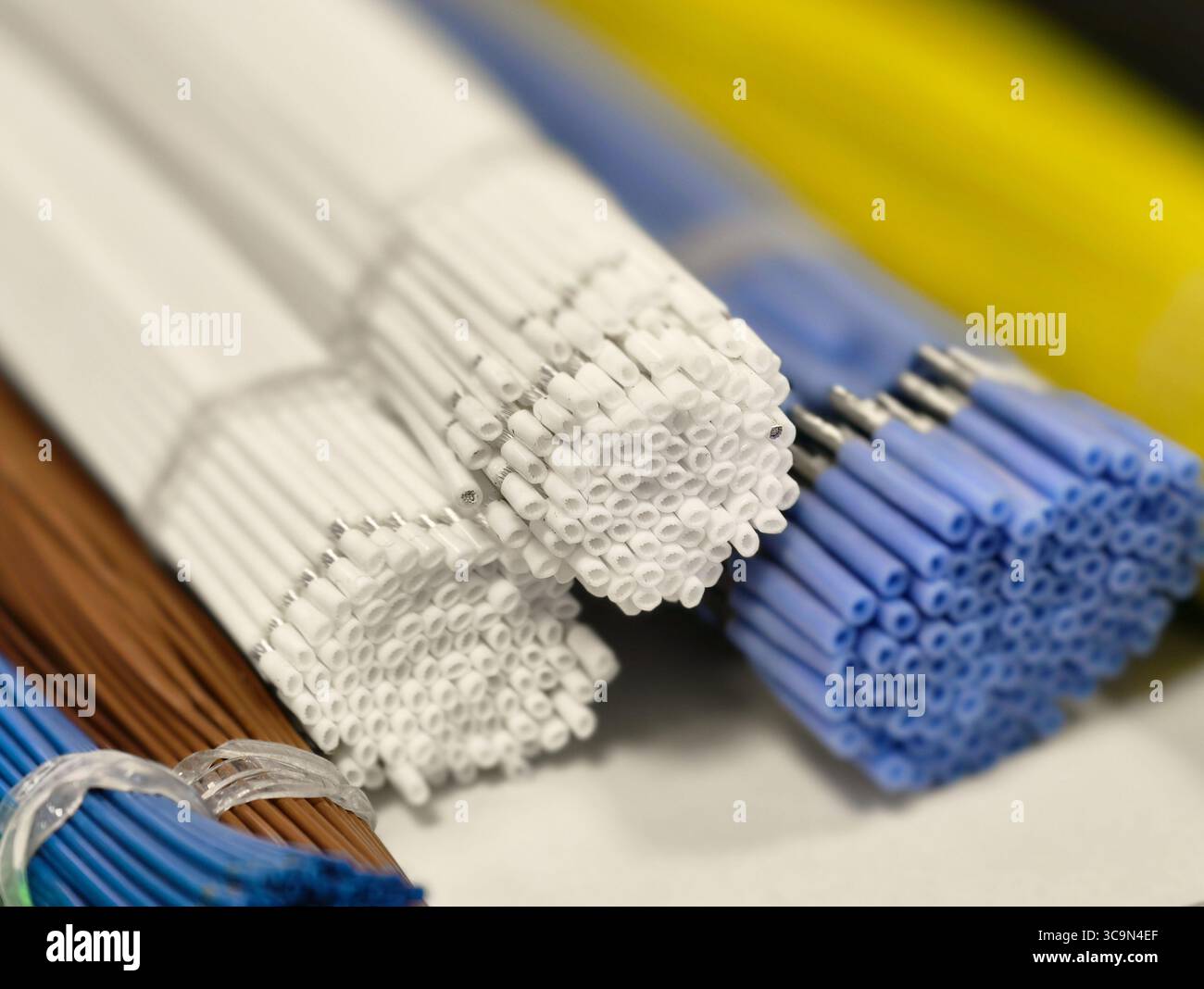 Colorful collection of various craft wires arranged neatly in a ...