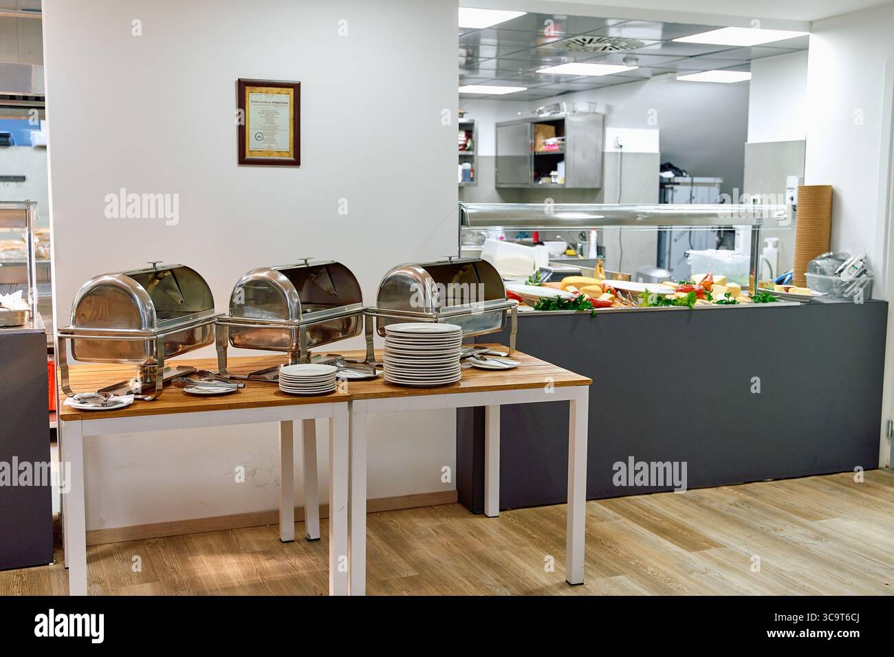 A Welcoming Setup of Buffet Stations with Elegant Chafing Dishes Ready ...