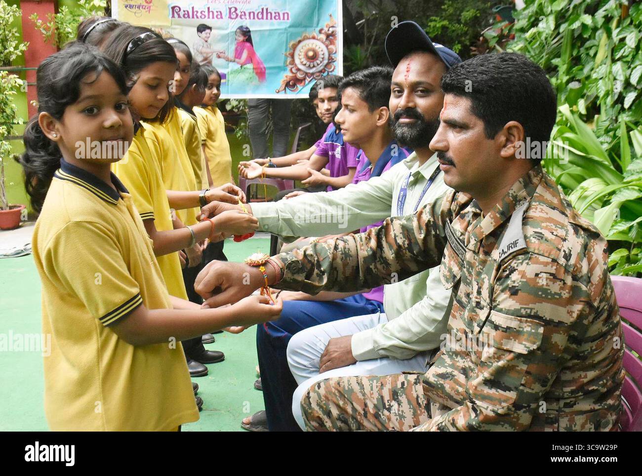 Patna, India. 05th Aug, 2025. PATNA, INDIA - AUGUST 5: Students tie ...