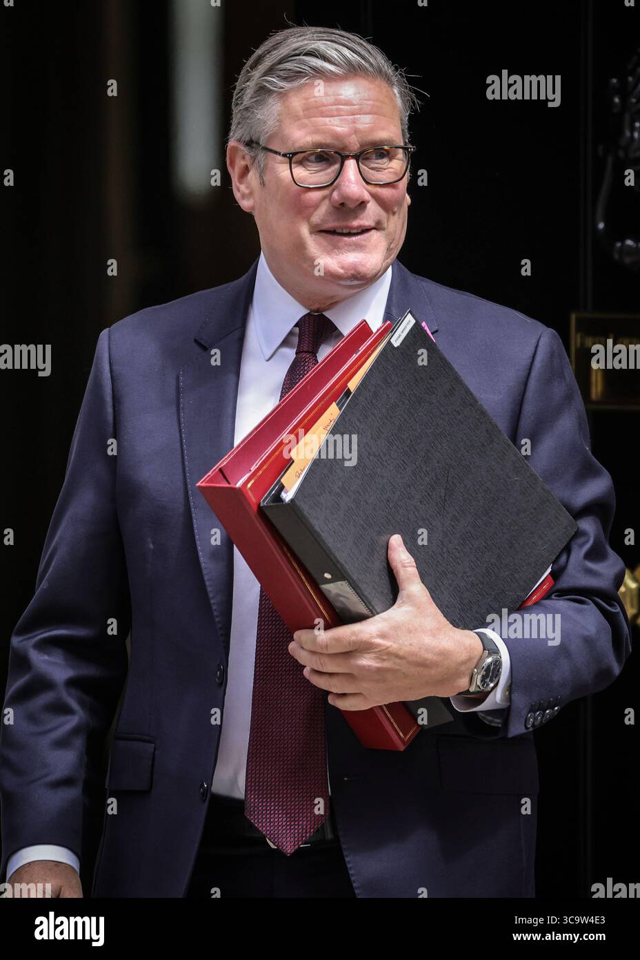 Sir Keir Starmer, Prime Minister of the United Kingdom, carries ...