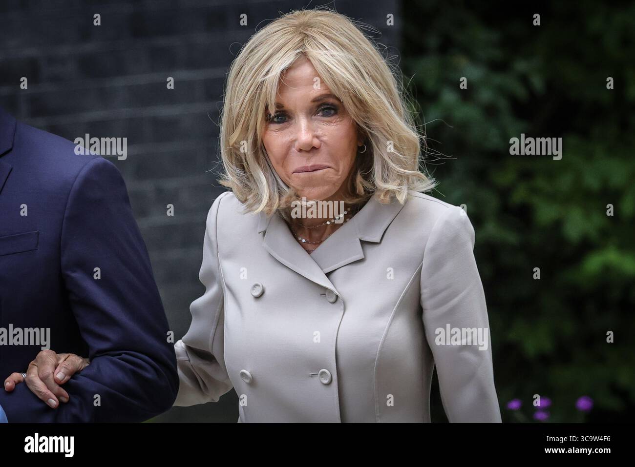 Brigitte Macron, close up, walks up Downing Street with husband ...