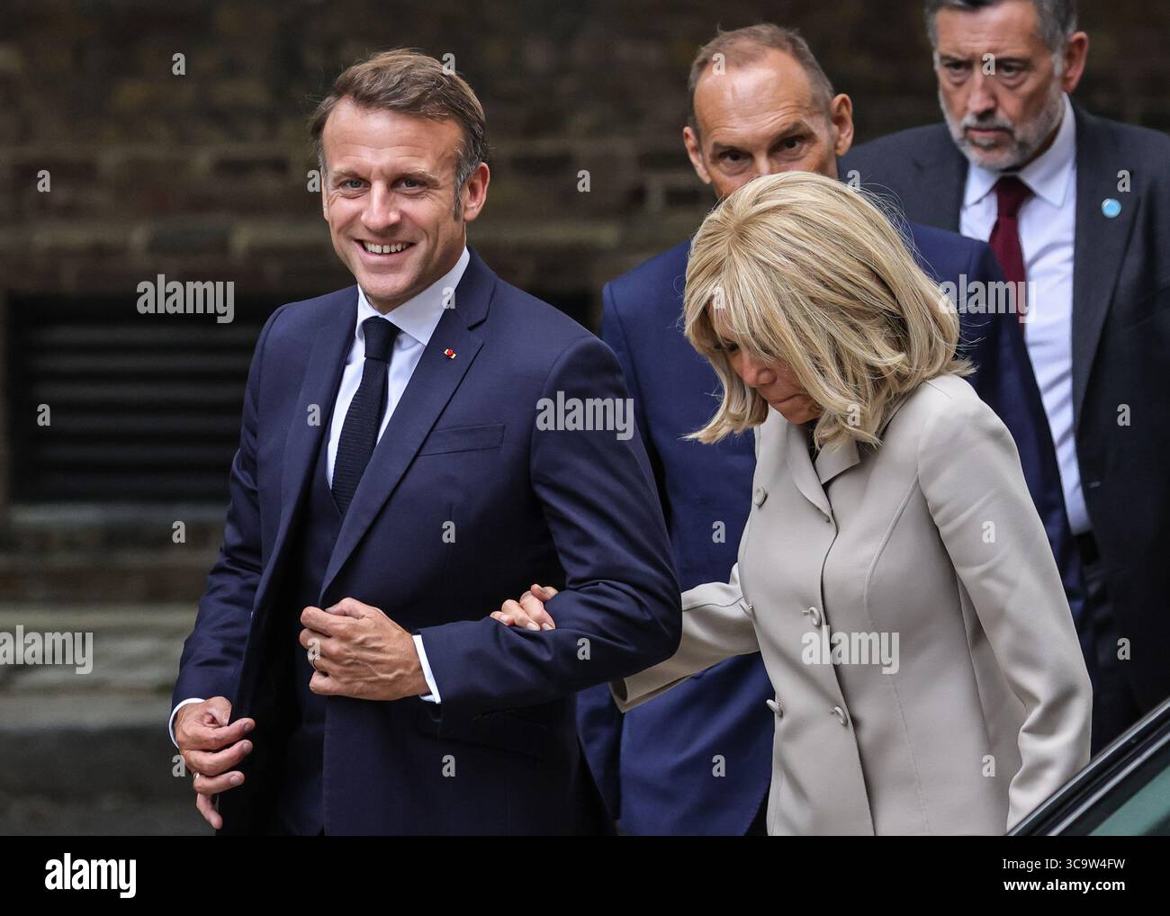 President of France Emmanuel Macron and wife Brigitte walk up Downing ...