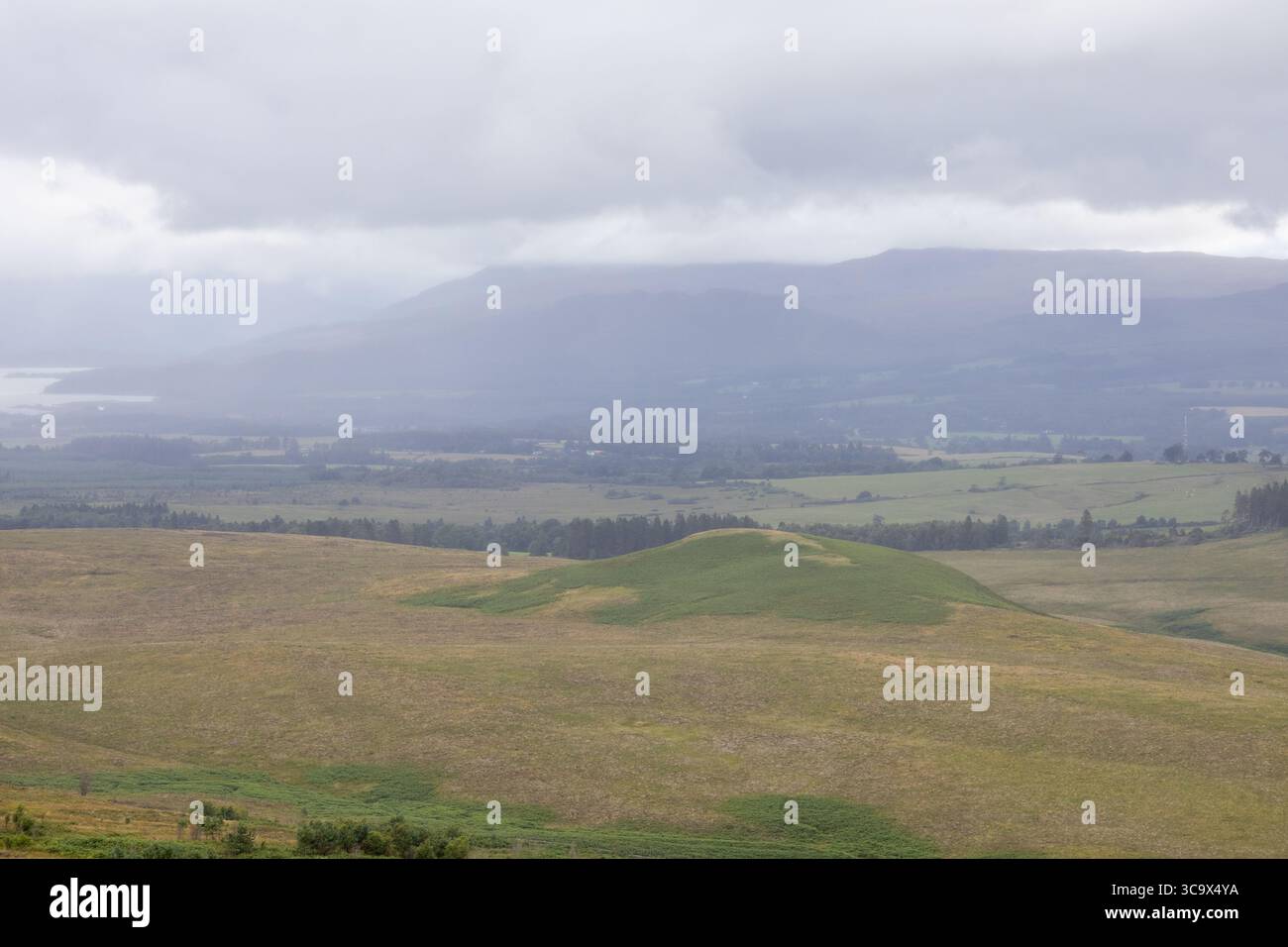 Expansive Scottish Highlands landscape with rolling hills, moody skies ...