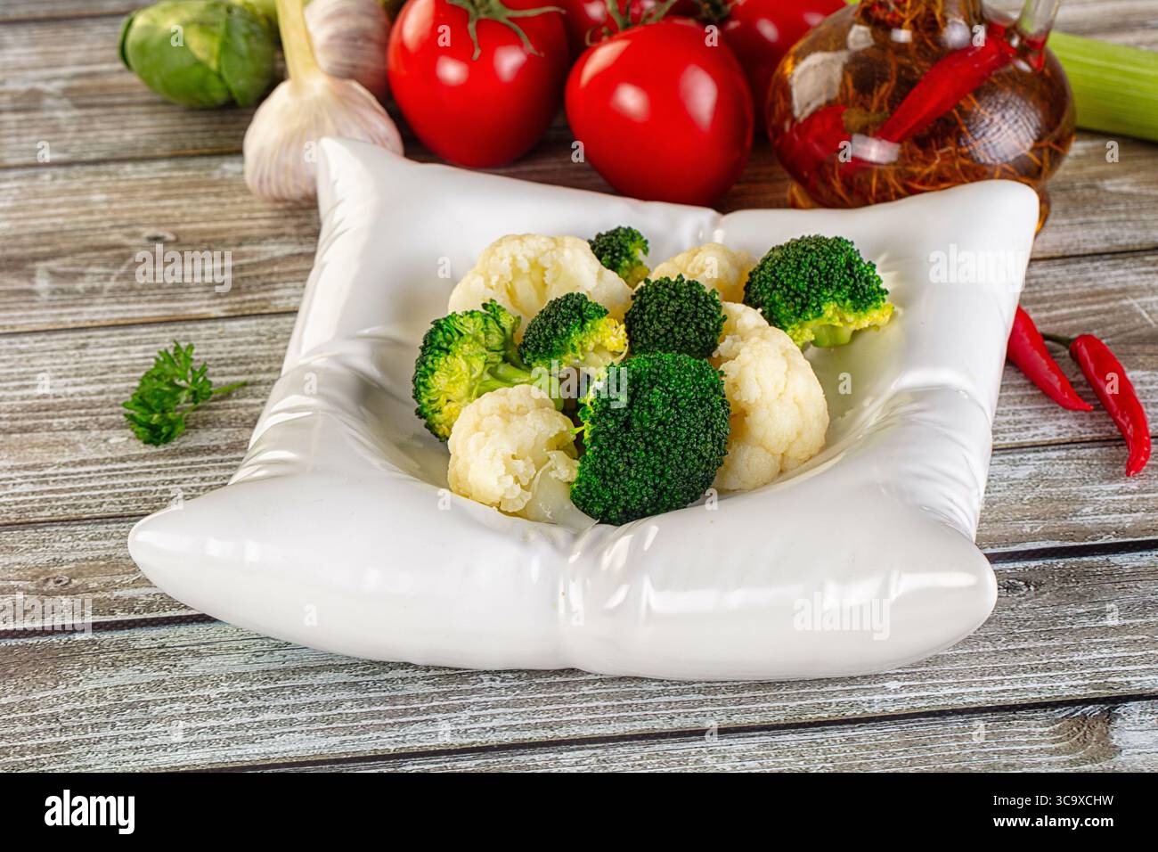 Vegan cuisine Steamed cauliflower and broccoli cabbage garnish Stock ...
