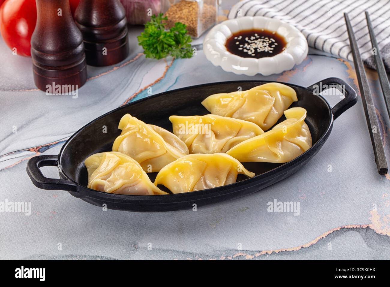 Japanese cuisine stuffed dumplings Gyoza with sauce Stock Photo - Alamy