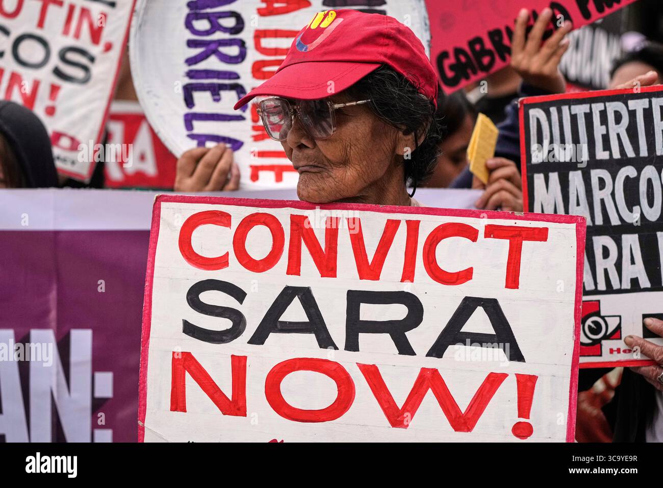 Protesters hold a rally outside the Philippine Senate demanding the ...