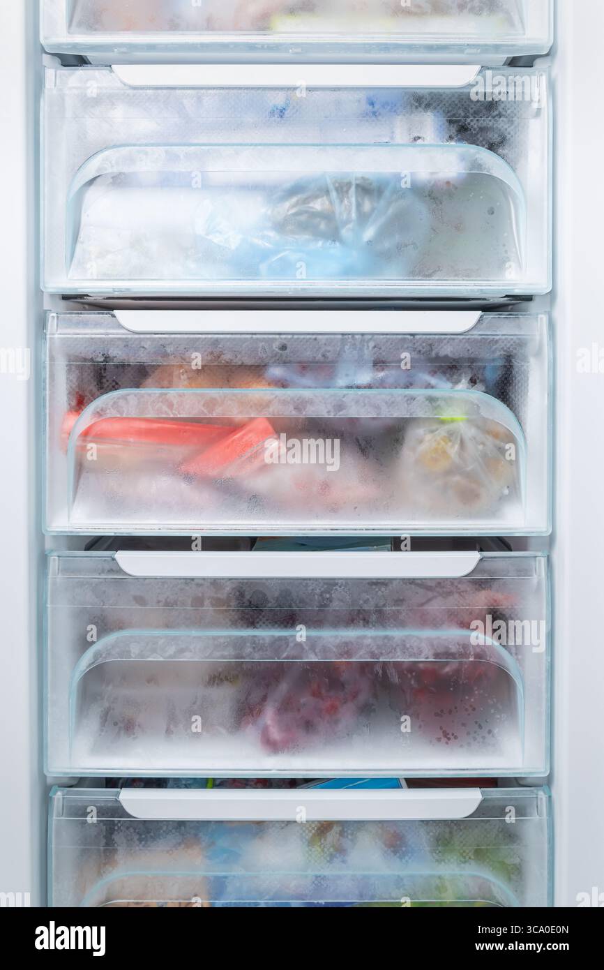 Open freezer with no-frost, household concept Stock Photo - Alamy