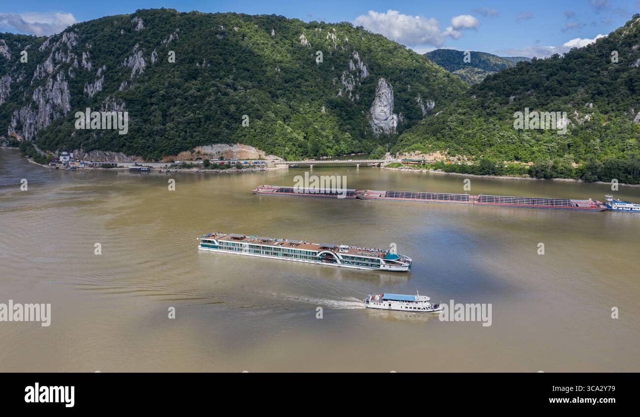Three types of Danube river ships traffic: a freight barge, a river ...