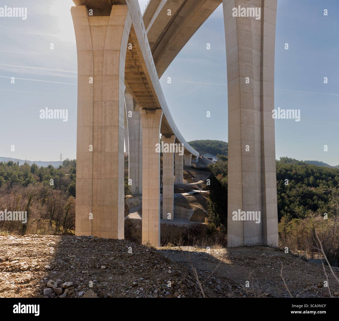 Construction site of a precast concrete highway viaduct in a hilly ...