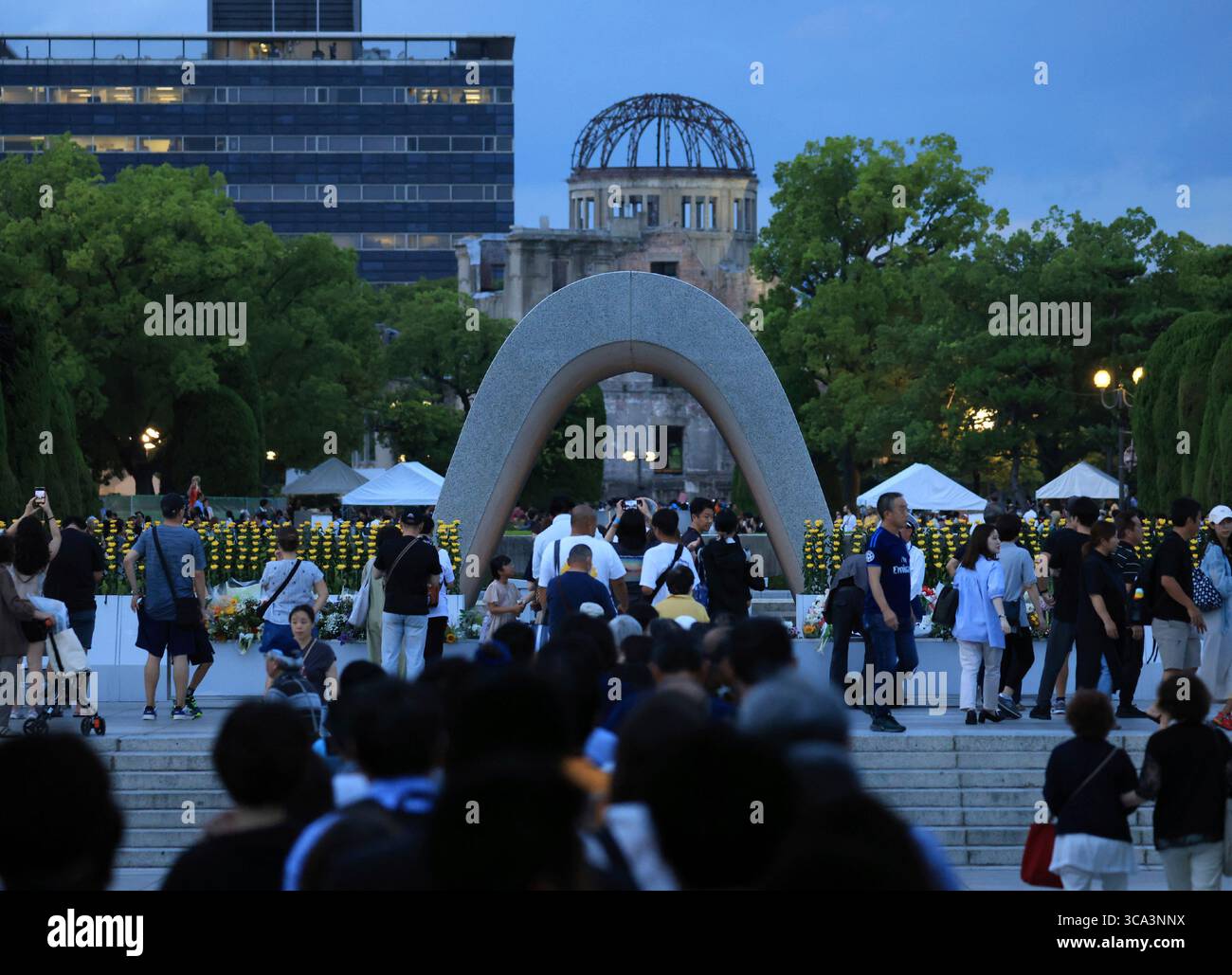 People visit the Cenotaph for the A-bomb Victims to pay their respects ...
