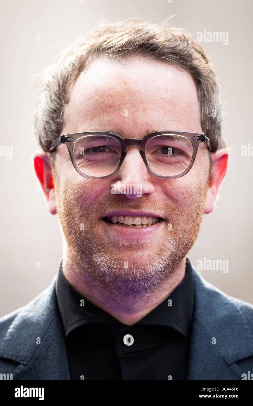 Andrew Mittman poses for photographers upon arrival at the premiere of ...