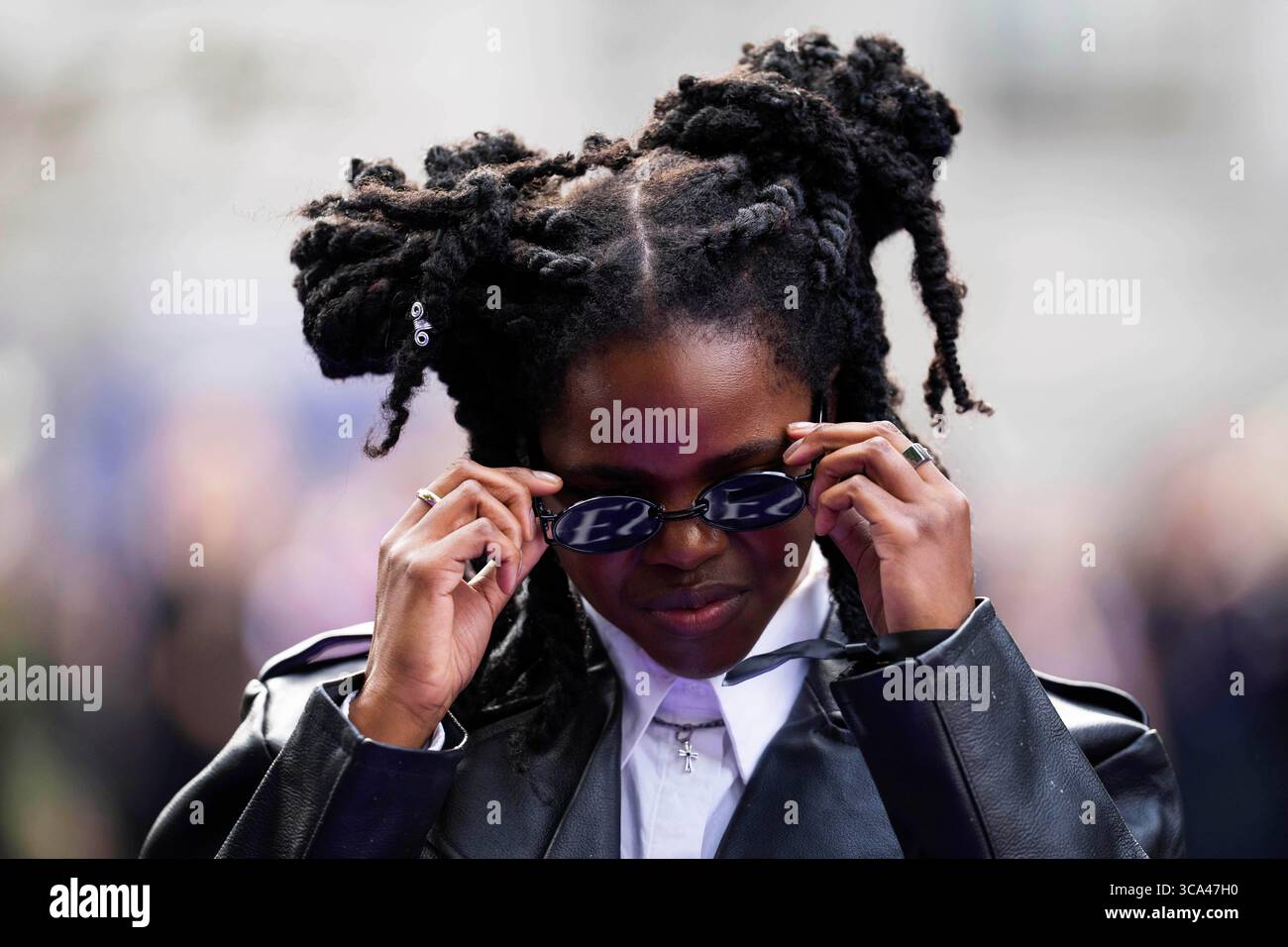 Francesca Amewudah-Rivers poses for photographers upon arrival at the ...