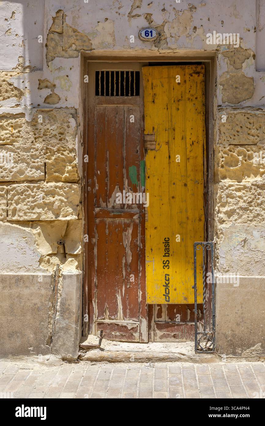 Buildings of a vernacular architecture of limestone blocks, typical of ...