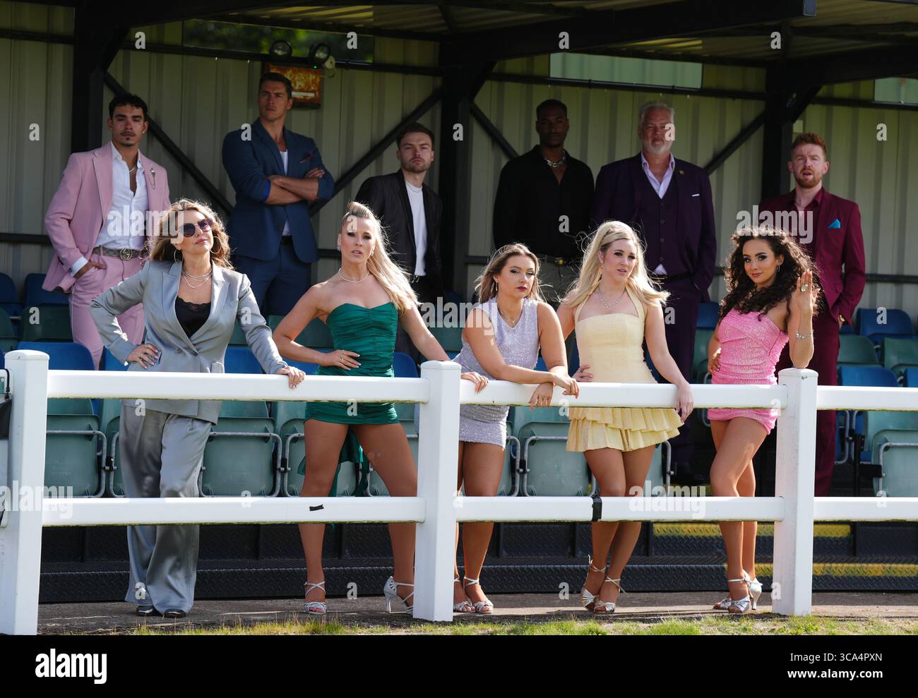 Performers from Footballers Wives: The Musical during a photicall at ...