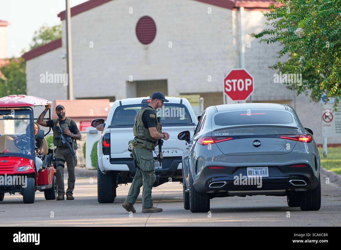 Cars enter the Federal Prison Camp, Bryan, Wednesday, Aug. 6, 2025, in ...