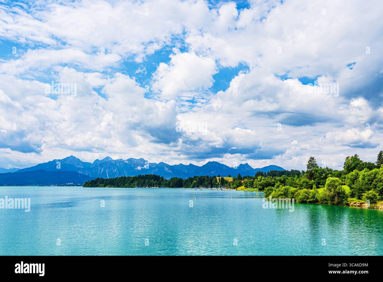 View over the Forggensee lake to the Allgau Alps near Fuessen, Germany ...