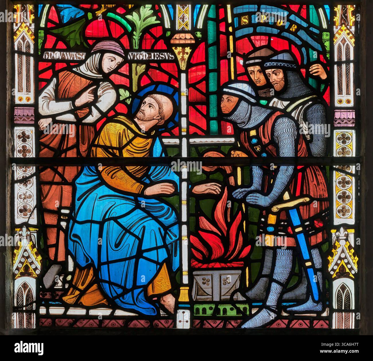 Stained glass window, of Peter denying knowing Jesus, in the christian ...