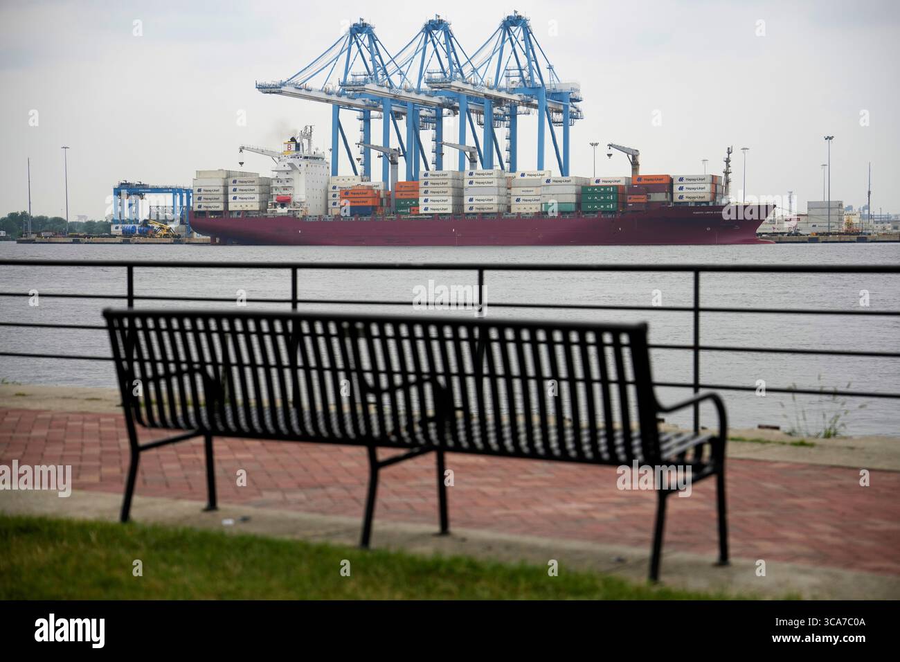 A ship is loaded with containers at the Port of Philadelphia, Wednesday ...