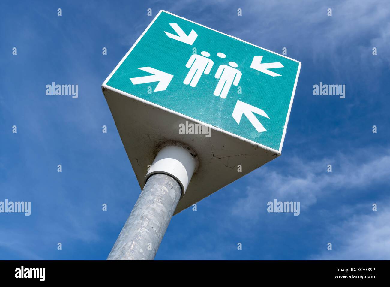 standardized pictogram for a fire safety assembly point Stock Photo - Alamy