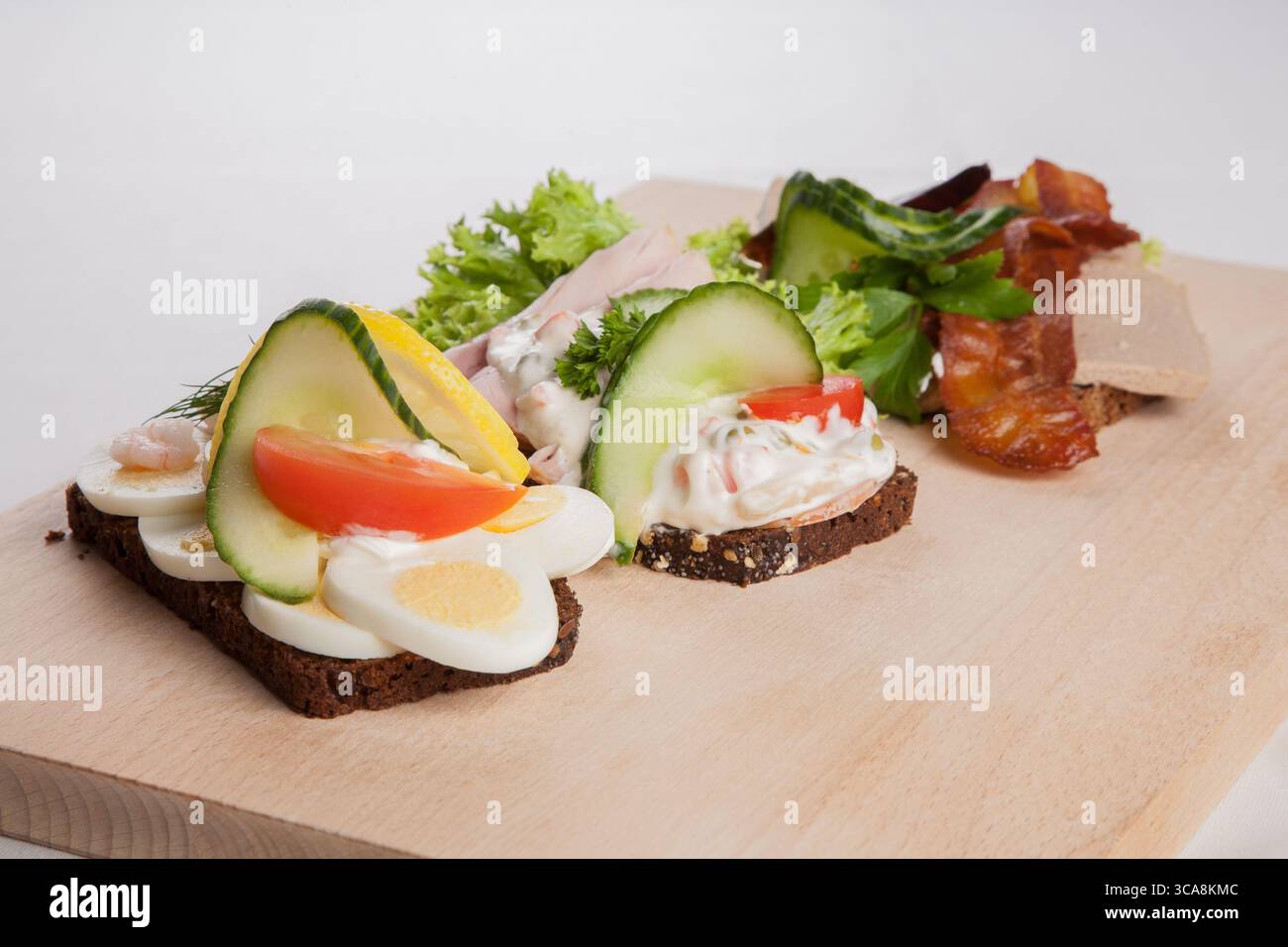 Experience a taste of Denmark with this classic smørrebrød platter ...