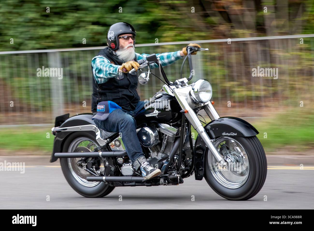 Fat man on motorcycle hi-res stock photography and images - Alamy