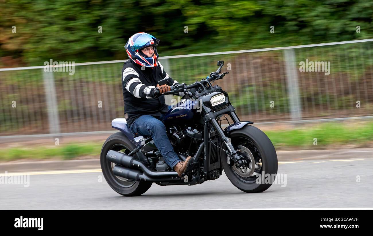 Fat man on motorcycle hi-res stock photography and images - Alamy