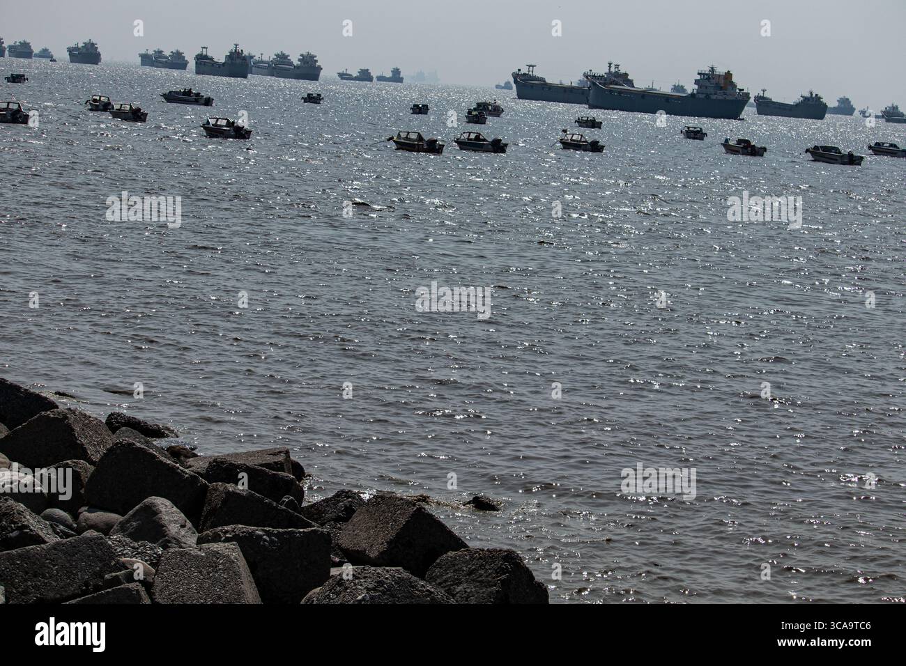 Seaside view of moving cargo ship at Patenga beach Stock Photo - Alamy